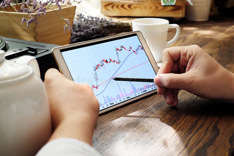 Tablet Computer with Stock Analytics and Abstract Graphs Stock Image ...
