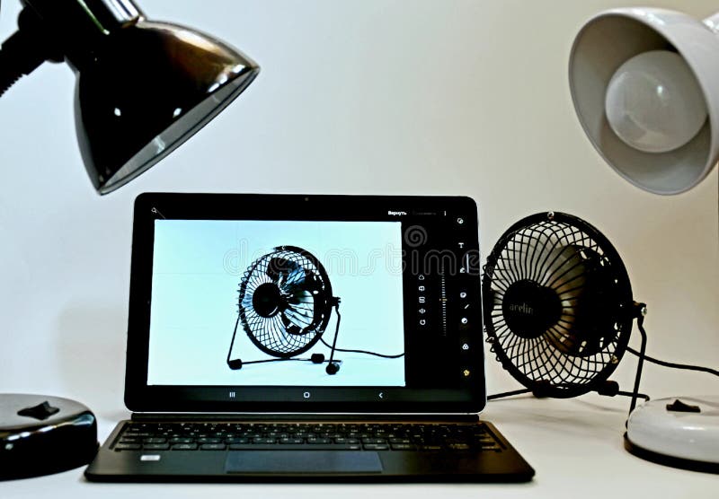 Tablet Computer Under Lamps with a Fan Stock Photo - Image of tablet ...