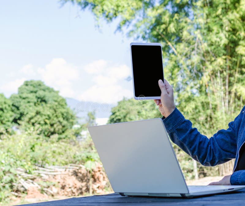 Tablet Computer in Woman Hand Stock Photo - Image of sitting, laptop ...