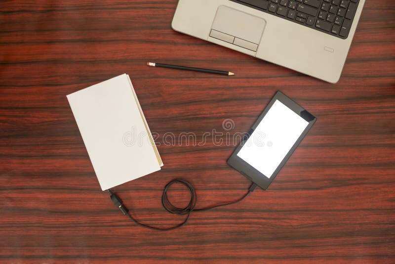 Tablet Connected To a Book. Data Transfer. Stock Photo - Image of ...