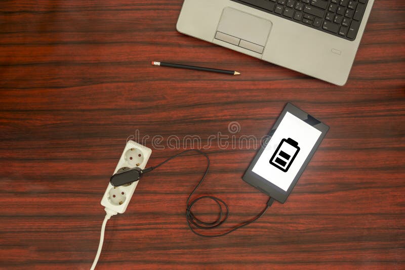 Tablet Connected To a Power Outlet. Stock Photo - Image of level ...