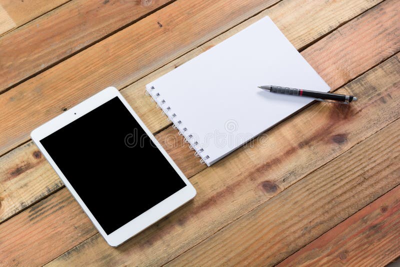 Tablet Device on Wooden Workspace Table Stock Photo - Image of desk ...