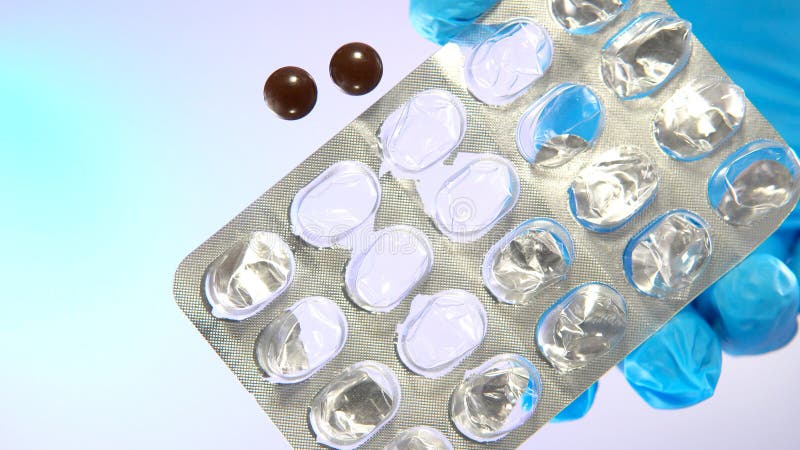 Tablet and Empty Package from Tablets on a Transparent Surface, Bottom ...