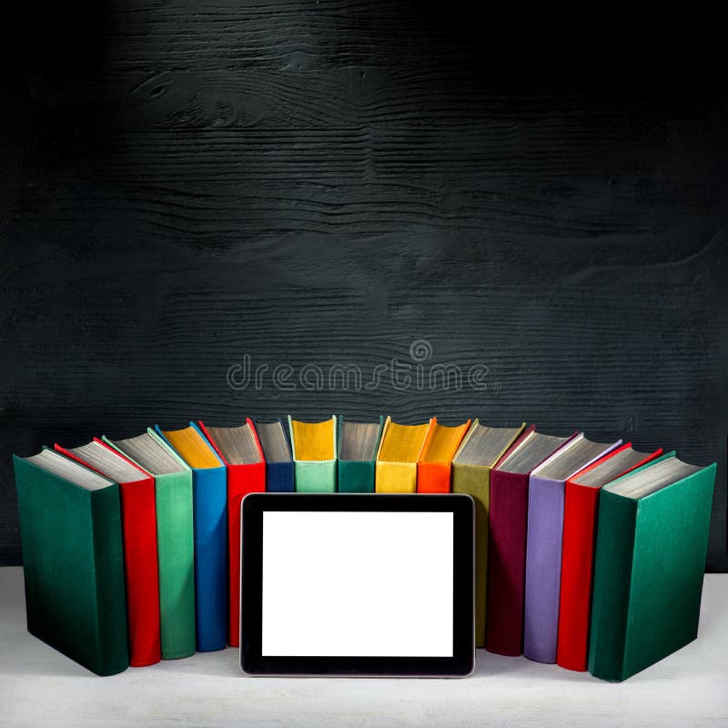 Tablet with Empty Screen with Colorful Books on Background with Stock ...
