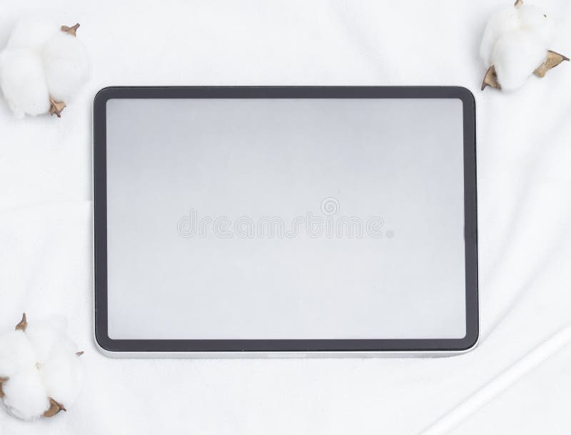 Tablet Empty White Screen with Pencil and Cotton Flower on White ...