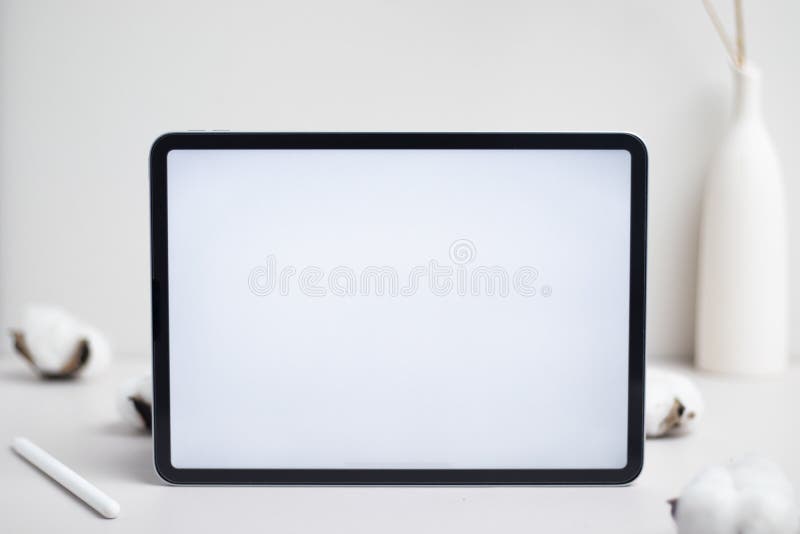 Tablet Empty White Screen with Pencil and Cotton Flower on White ...