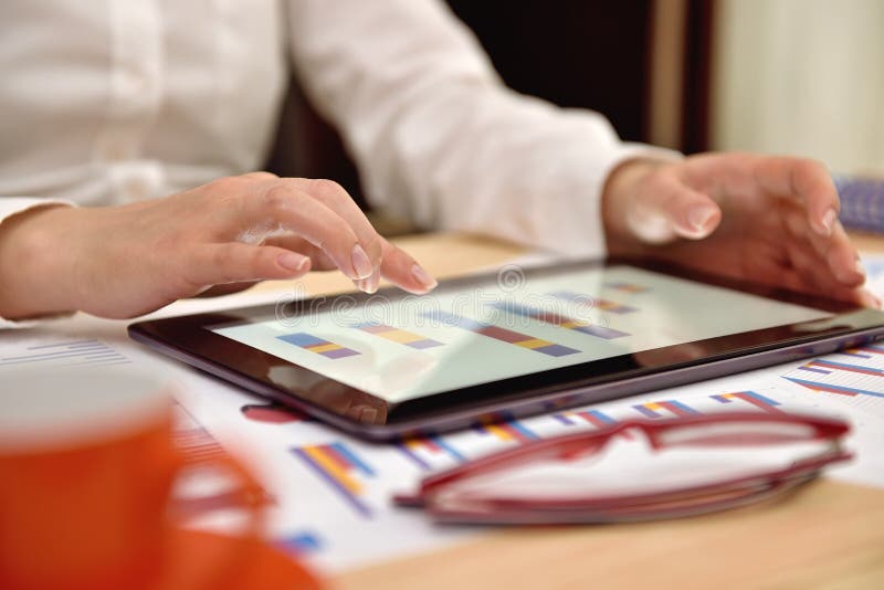 Tablet with financial data stock image. Image of desk - 88784149