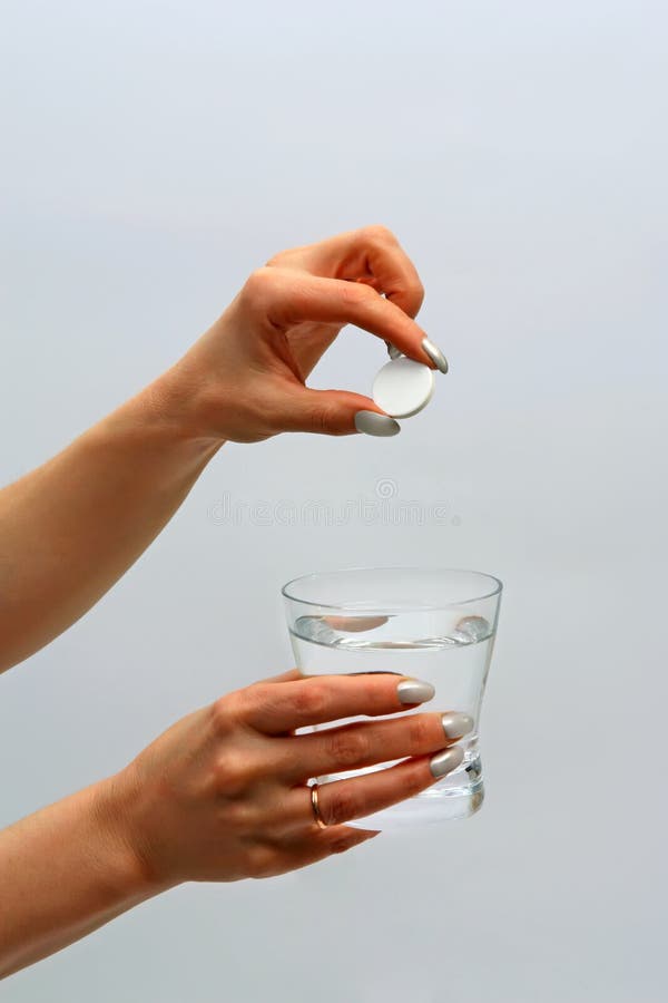 Tablet in glass water stock image. Image of industry - 13790055