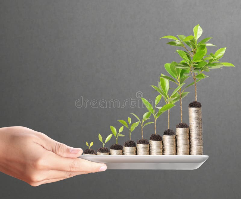 Tablet with Graph ,gold Coins Stock Image - Image of hand, closeup ...