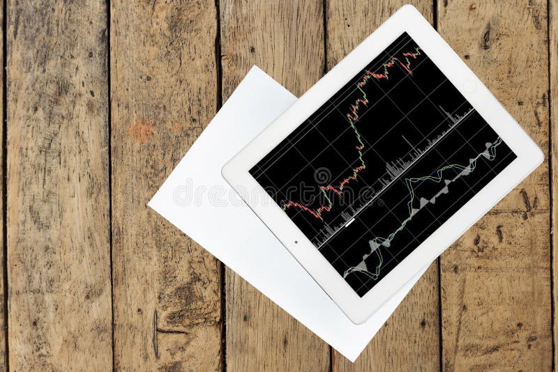 Tablet with Graph and Paper on Wood Table Stock Image - Image of mobile ...