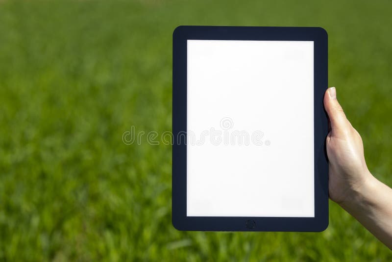 Tablet in hand stock image. Image of draw, frame, grass - 42035577