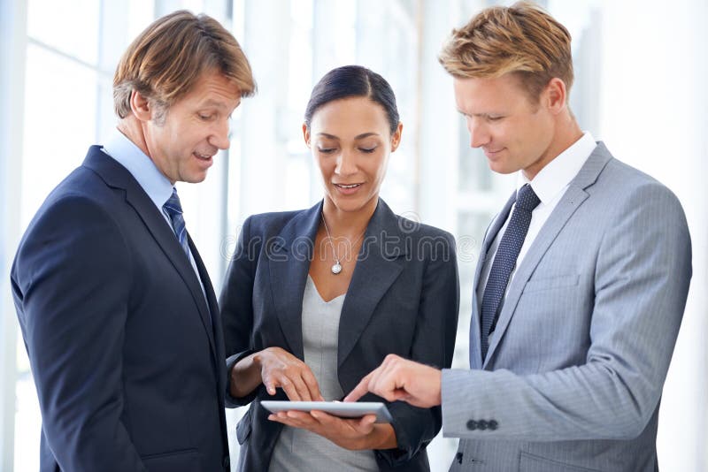 This Tablet Has Incredible Business Functionality. Three Businesspeople ...