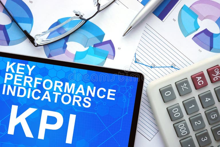Tablet with Key Performance Indicators , KPI , Graphs. Stock Photo ...