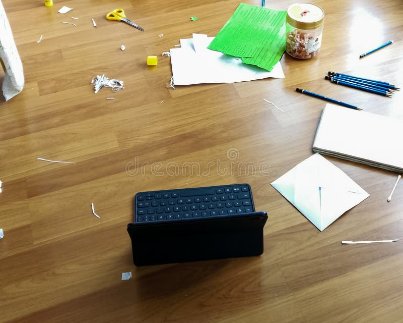 Tablet Laptop Computer on the Floor with Messy Items. Student Working ...
