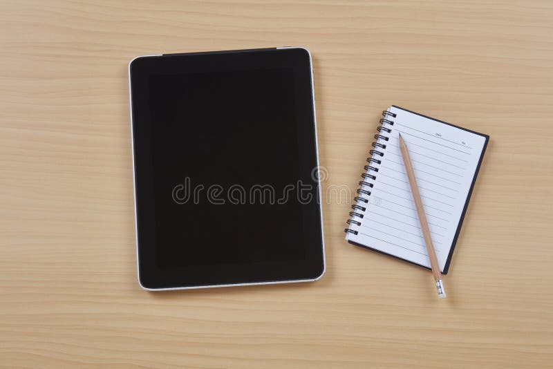 Tablet and Note Pad on Table Top Stock Photo - Image of business ...