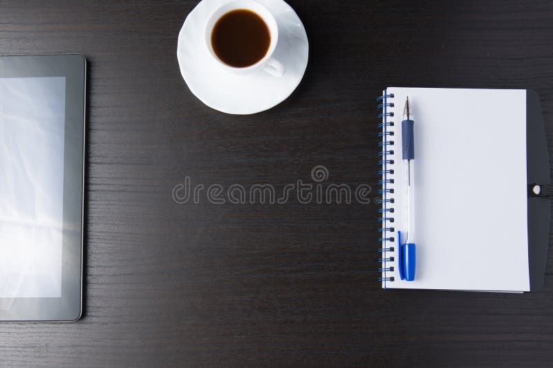 Tablet with Notebook and Pen on Dark Table Stock Photo - Image of wood ...