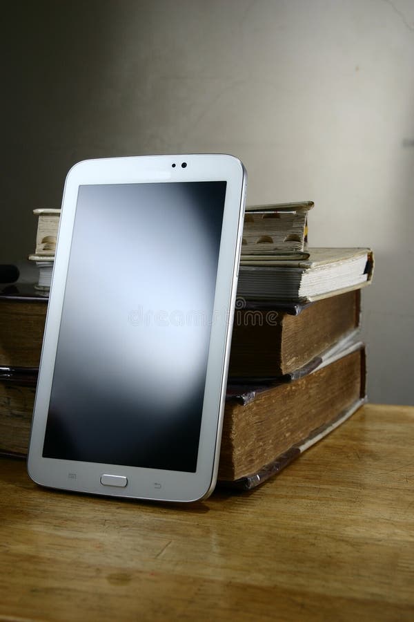 Tablet and old books stock photo. Image of talk, text - 37865752