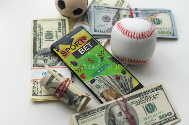 Tablet Pc with App for Sport Bets, on Top of Stacks of Banknotes, White ...