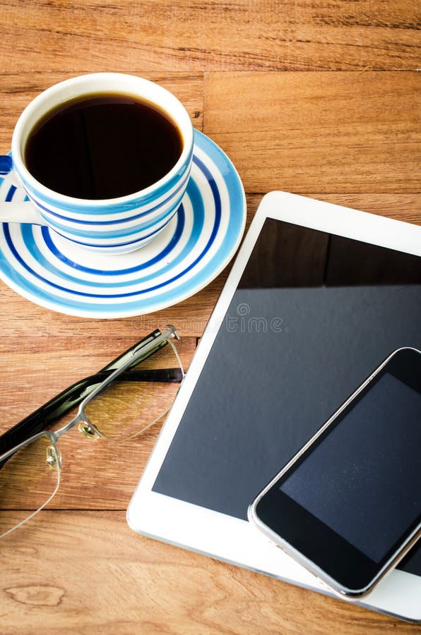Tablet Pc and a Coffee and Mobile Phone Stock Photo - Image of note ...