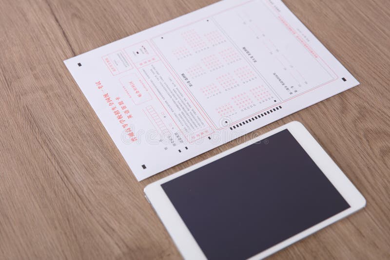 Tablet PC and Exam Answer Sheet Stock Image - Image of exam, online ...