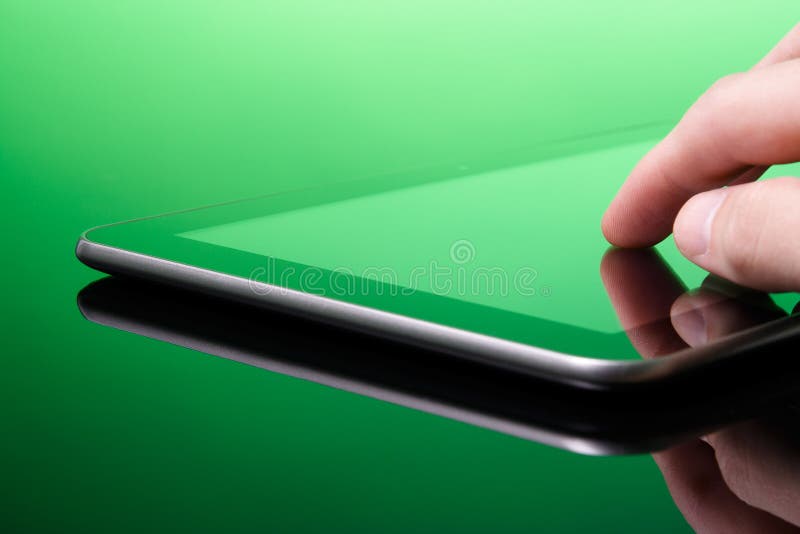 Tablet PC is green (eco) stock photo. Image of touching - 24601816