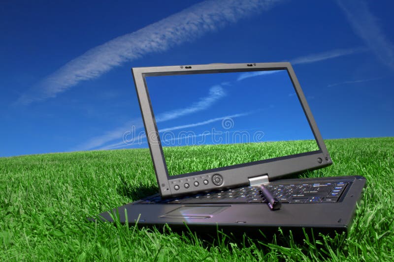 Tablet PC on green grass stock image. Image of blue, computer - 5550033