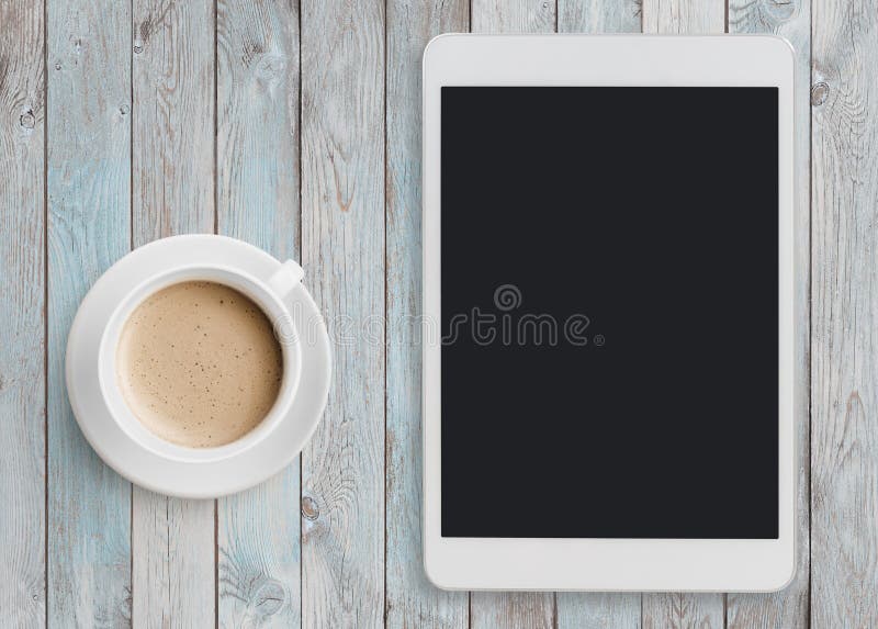 Tablet Pc Looking Like Ipad On Table With Coffee Cup Stock Photo ...