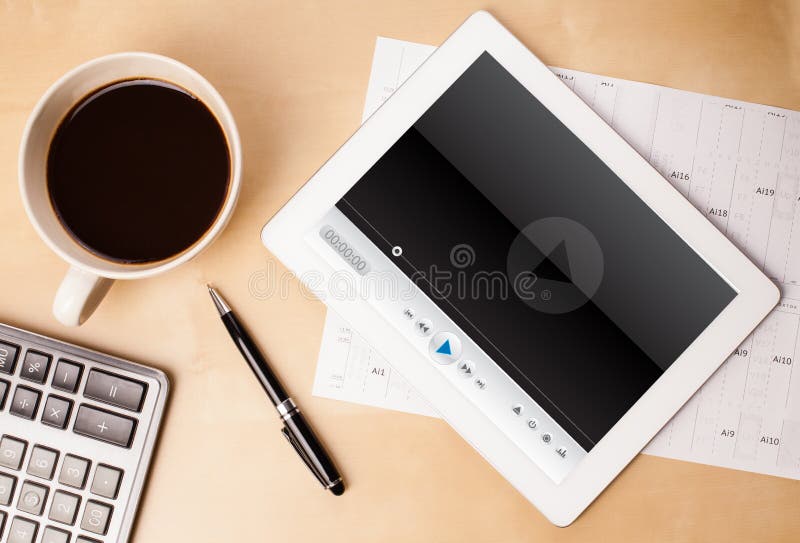 Tablet Pc Showing Media Player on Screen with a Cup of Coffee on Stock ...