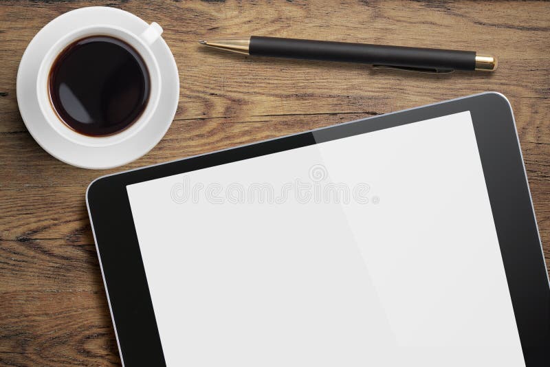 Coffee Cup and Tablet Pc Similar To Ipad on Dark Wooden Table Top View ...