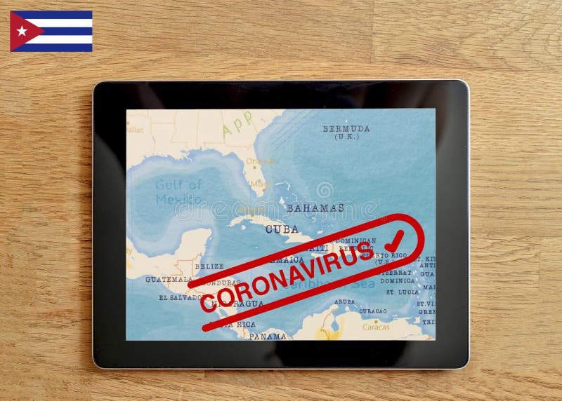 A Tablet PC Which is Displayed with Map of Cuba and Coronavirus Text on ...