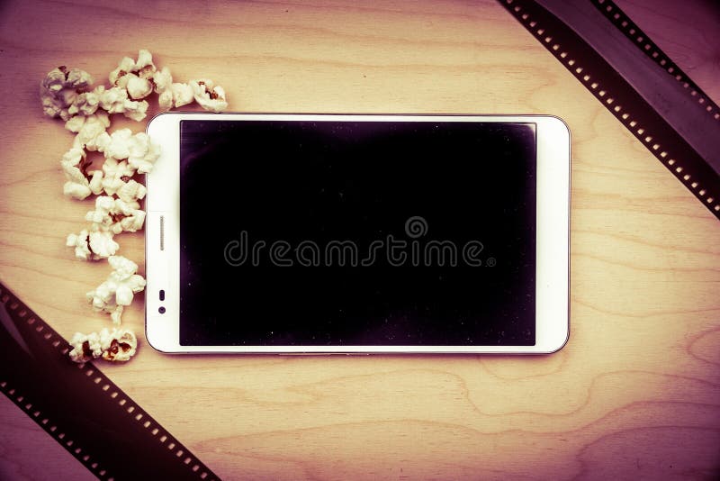 Tablet Pc on Wood with Attributes of Cinema. Stock Image - Image of ...