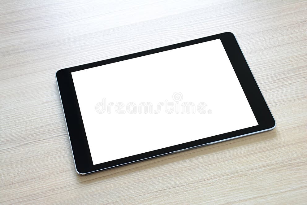 Tablet pc on wooden table stock photo. Image of business - 49197820