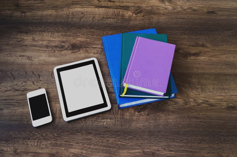 Tablet Phone and Books on the Table Stock Photo - Image of paper ...