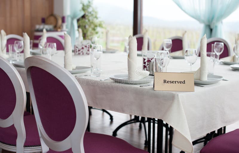 The Tablet is Reserved on the Table in the Restaurant Stock Image ...