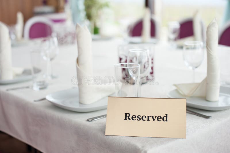 The Tablet is Reserved on the Table in the Restaurant Stock Image ...