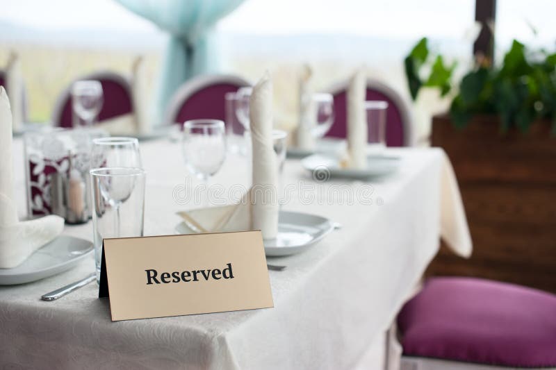 The Tablet is Reserved on the Table in the Restaurant Stock Image ...