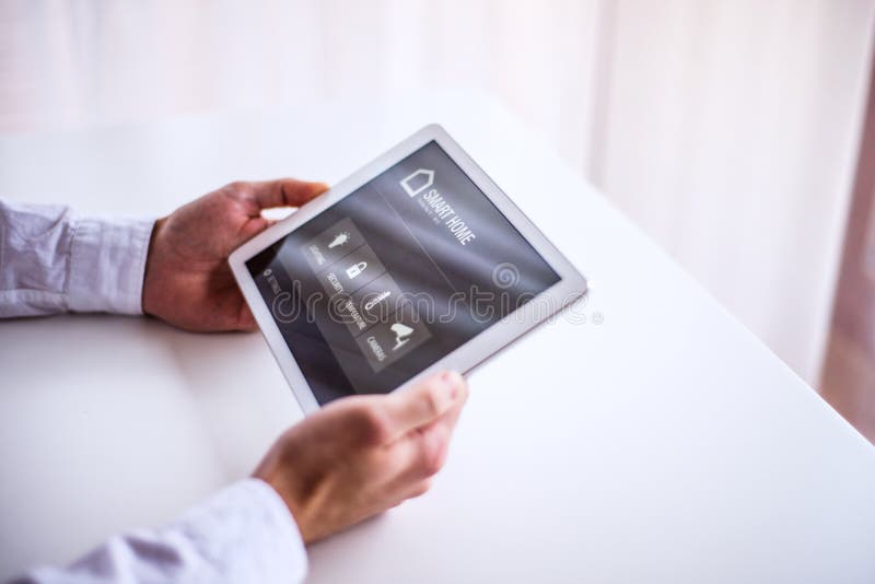 A Tablet with Smart Home Screen. Stock Image - Image of home, lighting ...