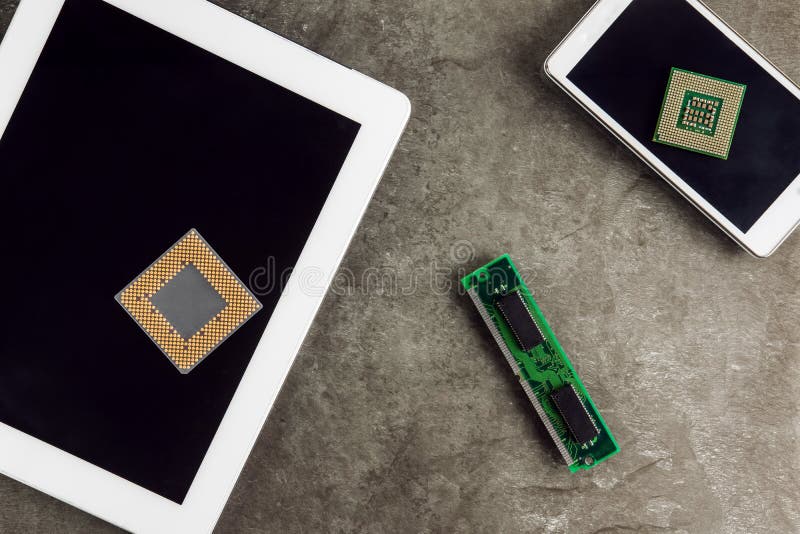 Tablet and Smartphone with Processors Stock Photo - Image of display ...