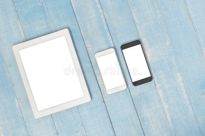 Tablet and Smartphones on Wooden Blue Table, Top View Stock Image ...