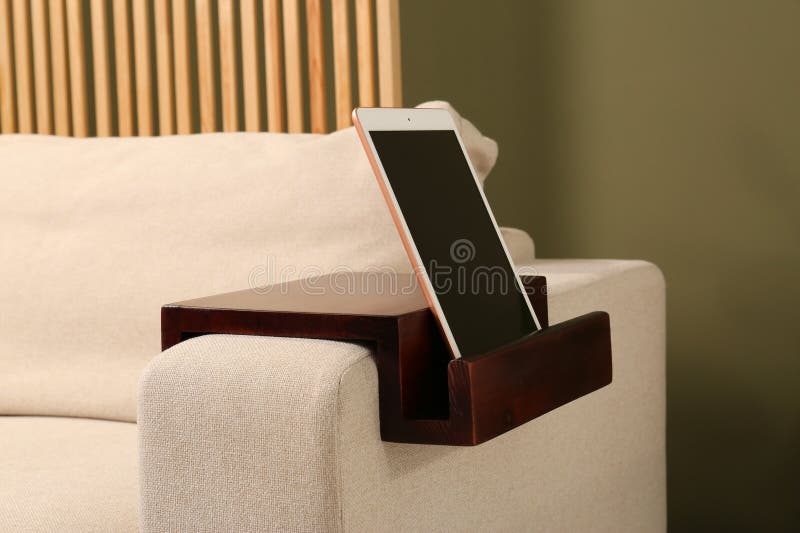 Tablet on Sofa Armrest Wooden Table in Room. Interior Element Stock ...