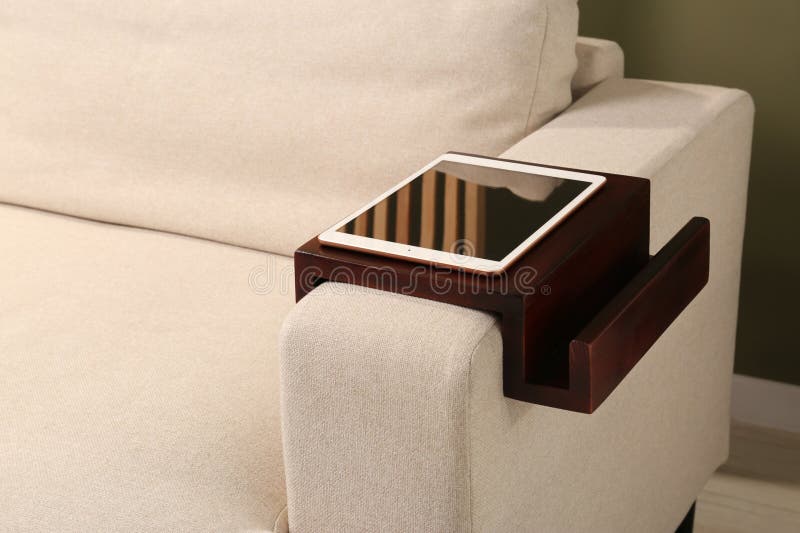 Tablet on Sofa Armrest Wooden Table in Room. Interior Element Stock ...