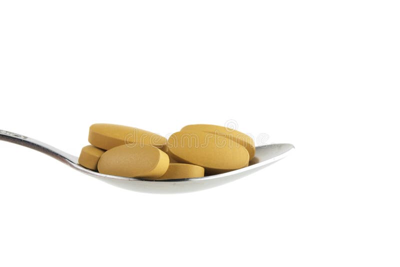 Tablet on the spoon stock image. Image of cure, isolated - 20703513