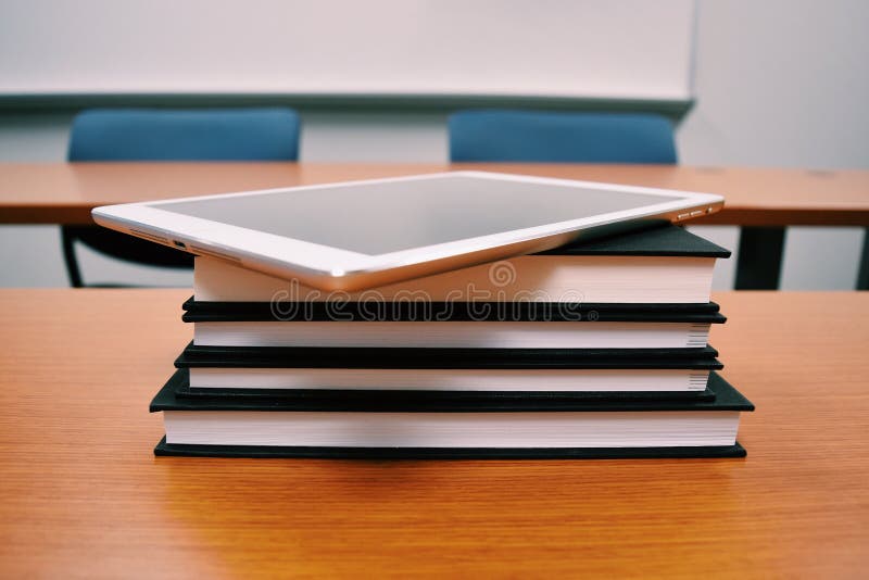 Tablet On Stack Of Books In Classroom Picture. Image: 85361721