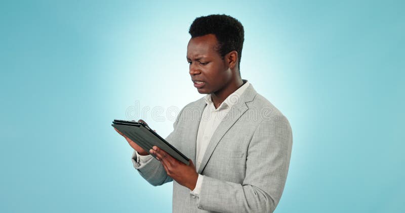 Tablet, Stress and Blue Background with a Business Black Man in Studio ...