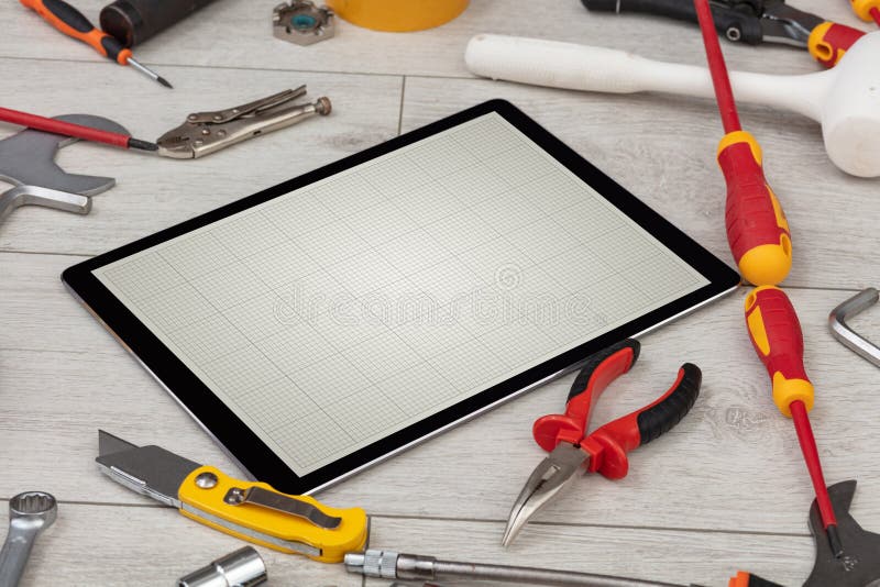 Tablet with Tools and Grid Screen Concept Stock Photo - Image of ...
