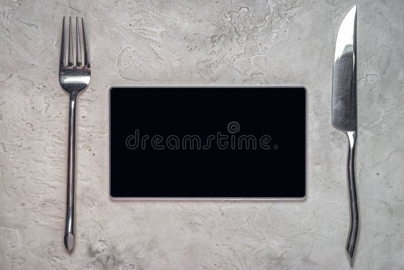 Tablet stock photo. Image of equipment, lots, fork, grey - 85265216