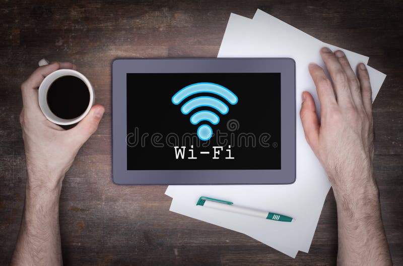 Tablet with Wi-Fi Connection on a Wooden Desk Stock Image - Image of ...
