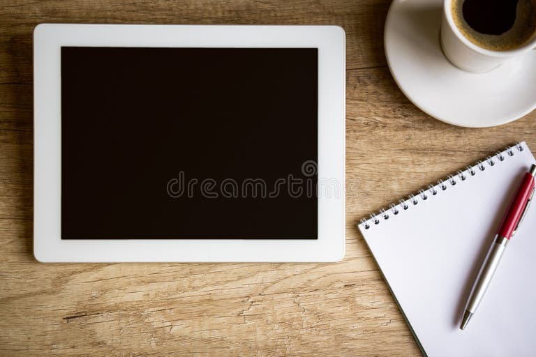 Tablet on wooden table stock photo. Image of gadgets - 41583596