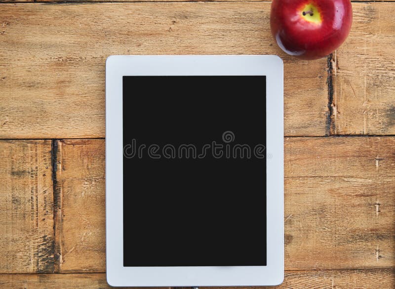 Tablet on Wooden Table with Red Apple Stock Image - Image of blank ...