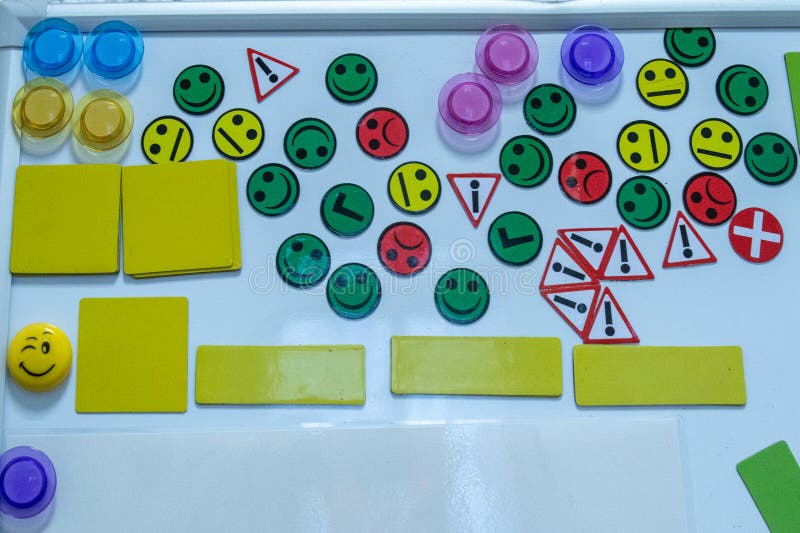 A Tabletop Game Setup Featuring Colorful Game Tokens, Cards, and ...